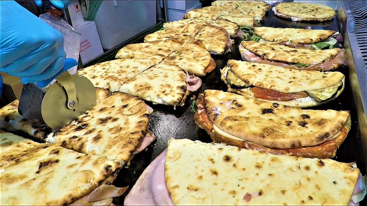 Italy Street Food. Large Flat Bread 'Spianata' Stuffed with Ham, Salami ...