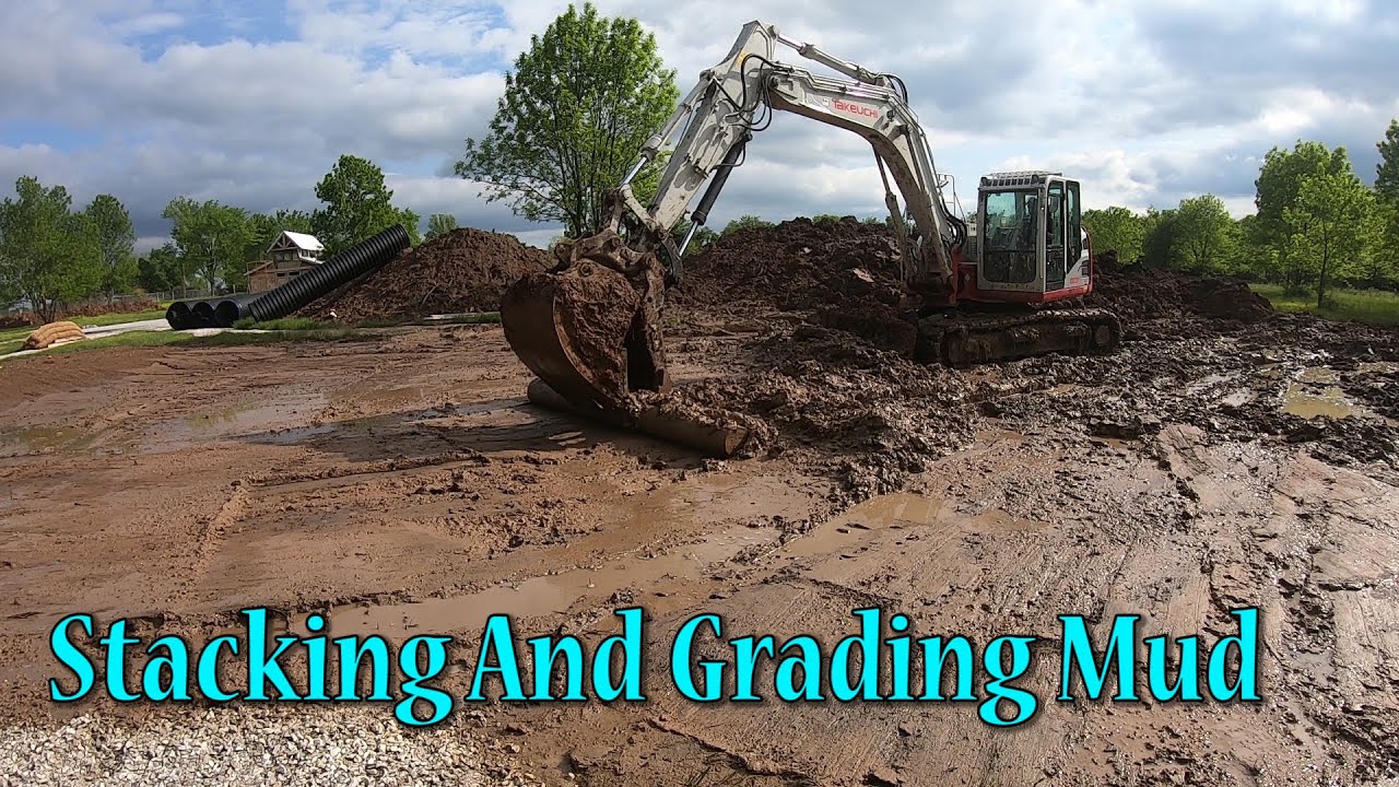 Stacking And Grading Mud With The Takeuchi TB2150 - YouTube