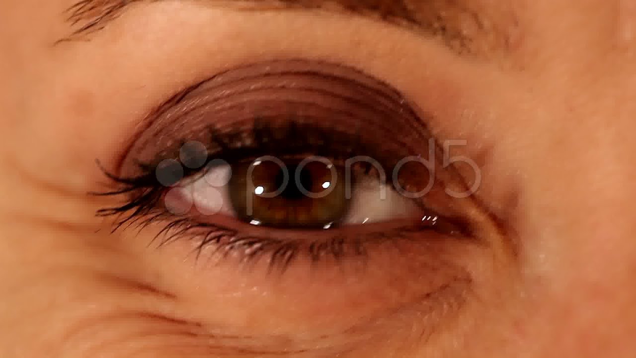 Female Eye Expression Closeup - Looking Around And Smiling. Stock ...