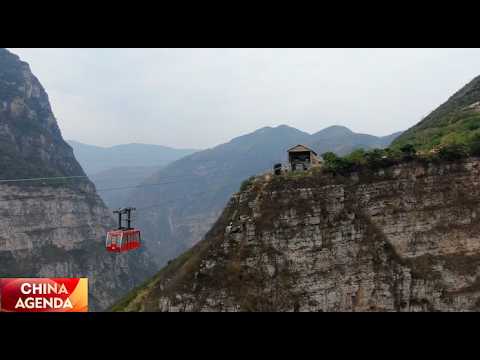 Cableway transforms life in China’s remote Gulu village - YouTube