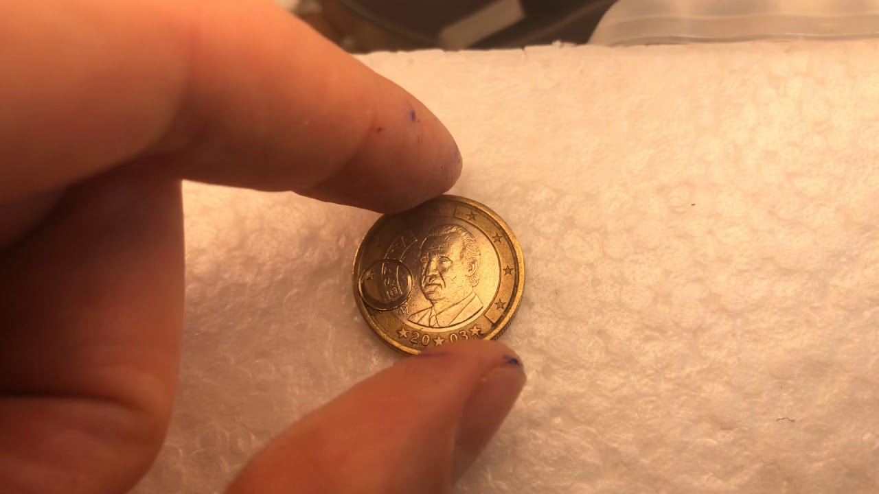 1 Euro Coin with ring stamped into it - YouTube