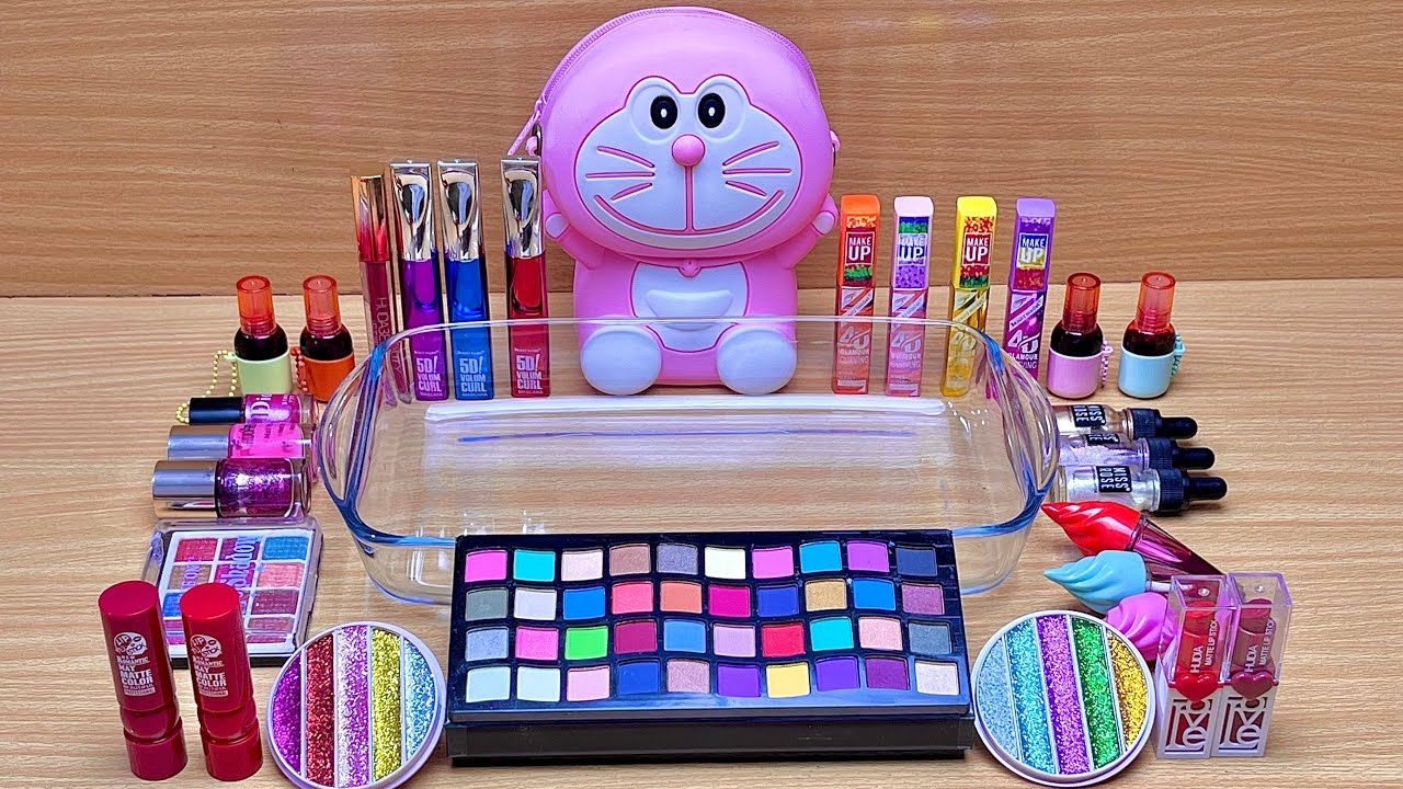 Pink Doraemon Makeup Slime !! Mixing Makeup Part’s & Glitter into Clear ...