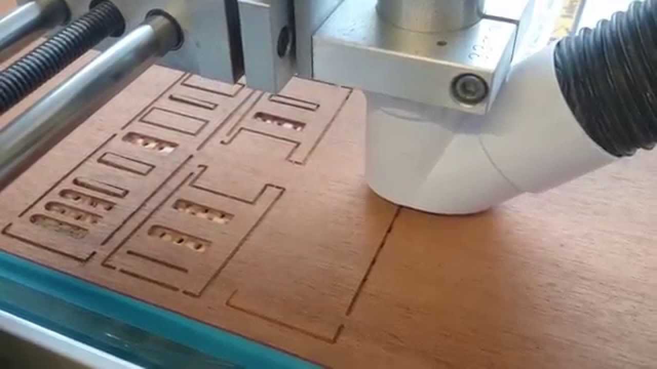Stepfour Basic 540 CNC router, cutting 1.5mm mahogany plywood - YouTube