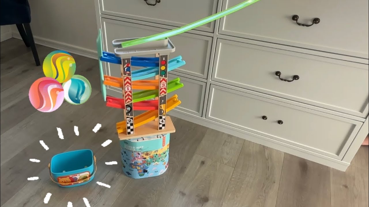 Marbles zig zag down ramp and landing in bucket - YouTube