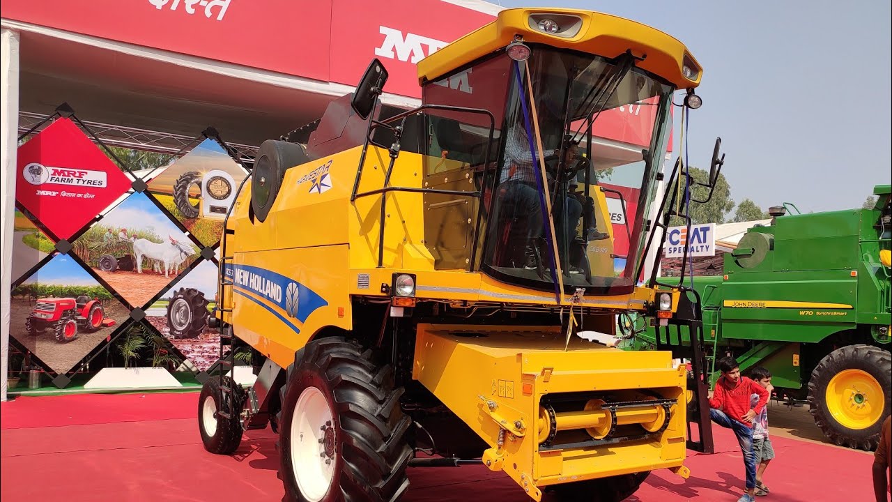 NEW HOLLAND COMBINE AC - YouTube
