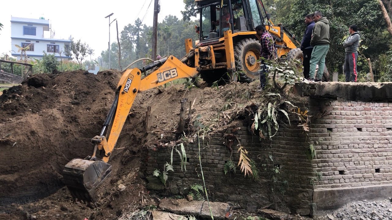 JCB backhoe loader making bridge foundation video - YouTube