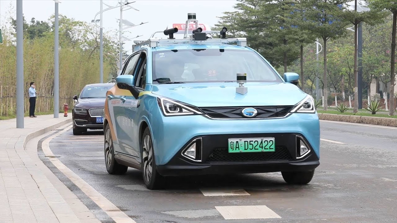 China's first self-driving taxis hit the road in Guangzhou - YouTube