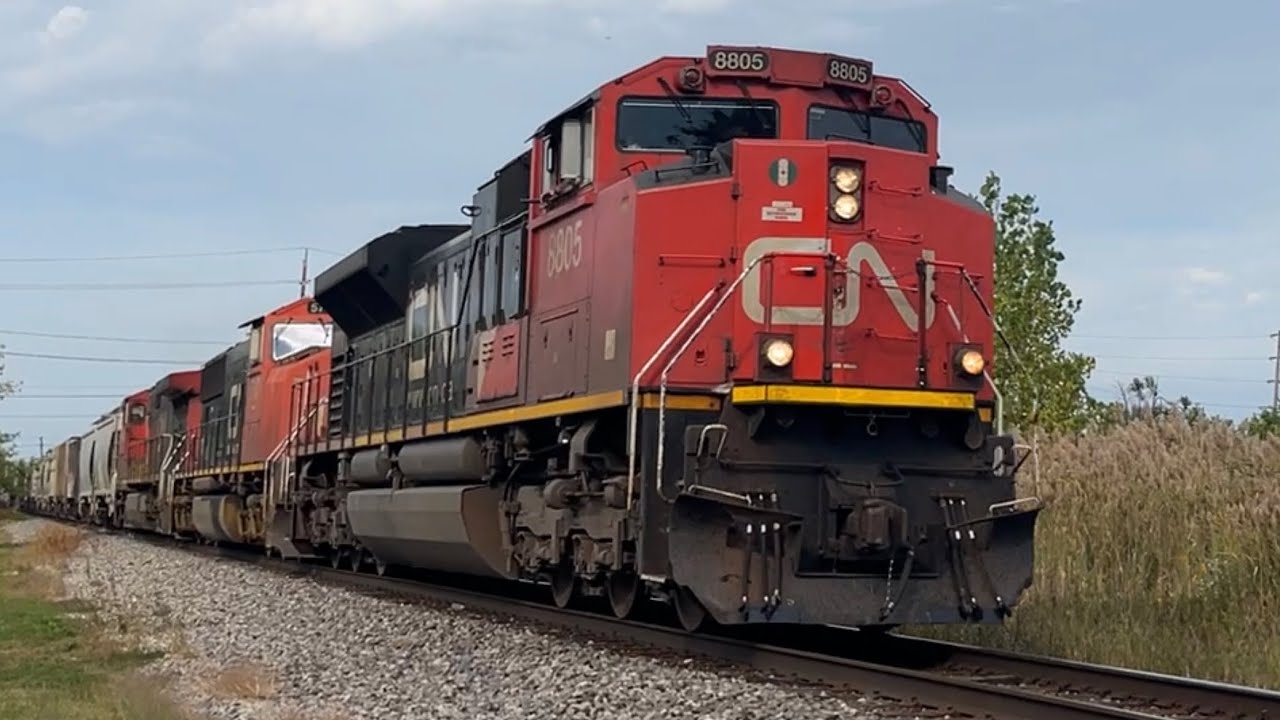 CN #’s 8805 (SD70M-2), 5707 (SD75I), & 2644 (C44-9W) leads CN M385 ...