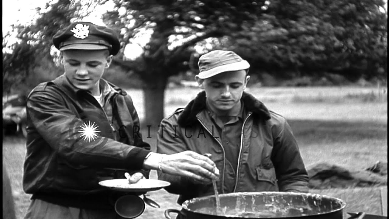 United States 9th Air Force in France; Army airmen in chow line and ...