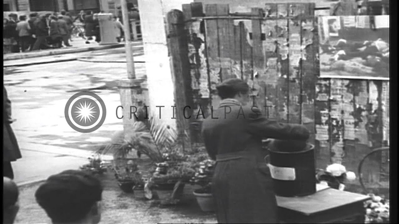 People look at the point where Mussolini and others were hanged after ...