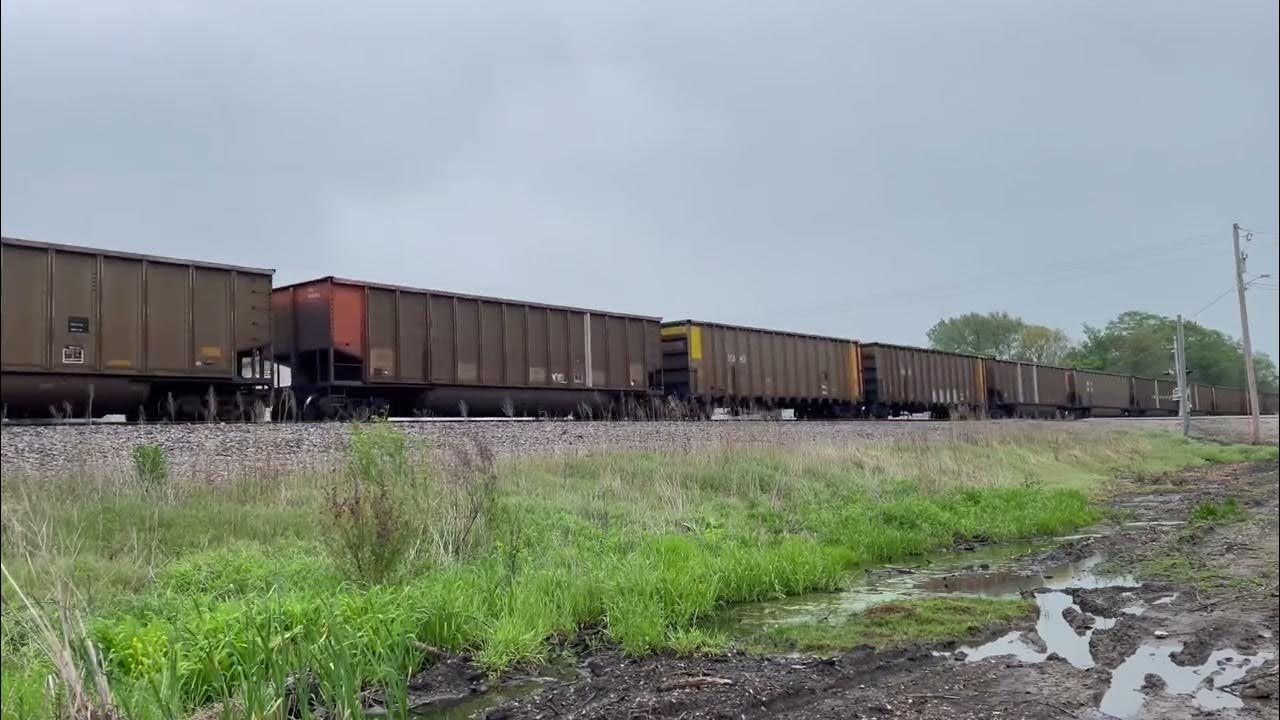 BNSF Executive Mac (White Ghost) Duo with a friendly engineer pulling empty coal hoppers - YouTube