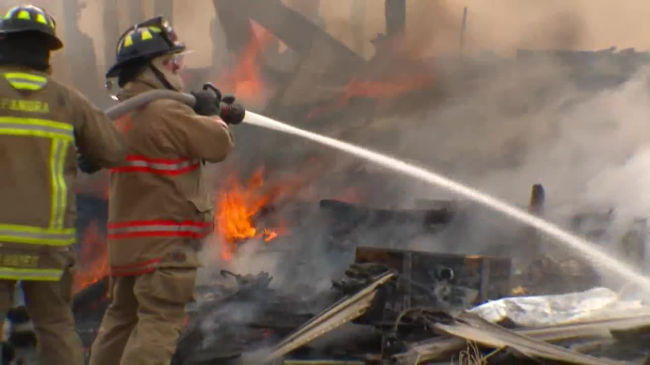 RAW VIDEO: Crews work to put out structure fire in Linden, Iowa - YouTube