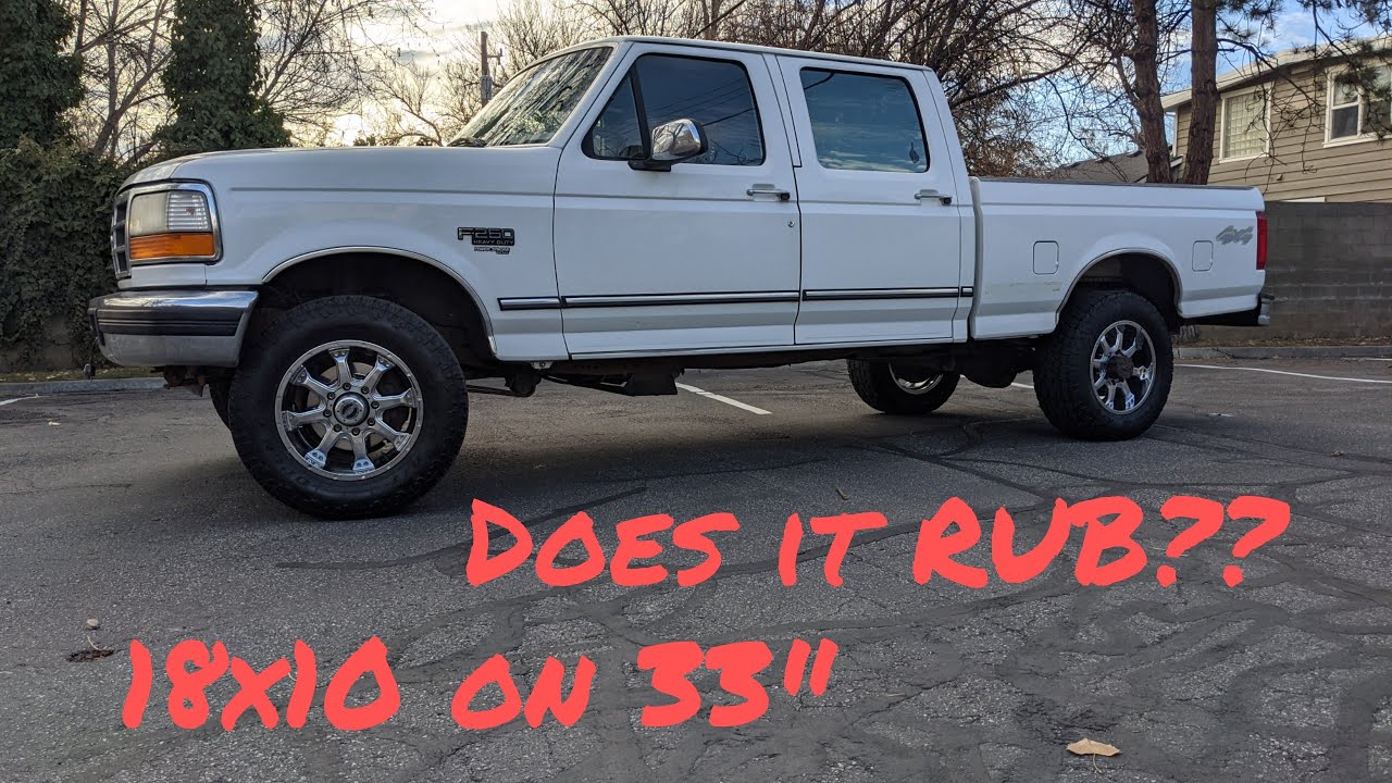 Do they RUB!? Stock 97 F-250 POWERSTROKE with 18x9 on 33" NO LIFT - YouTube