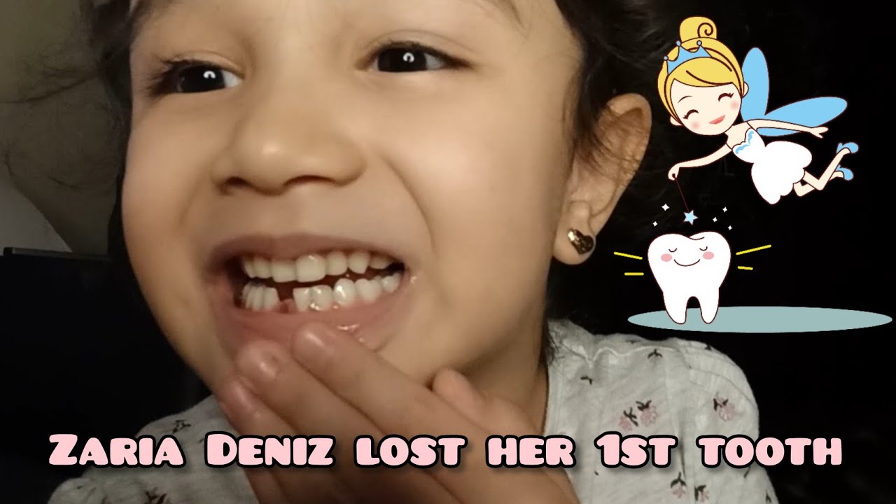 First lost tooth + surprise present from tooth fairy - YouTube