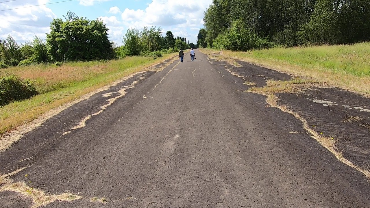 Long walk to the plowed field at old army base - YouTube