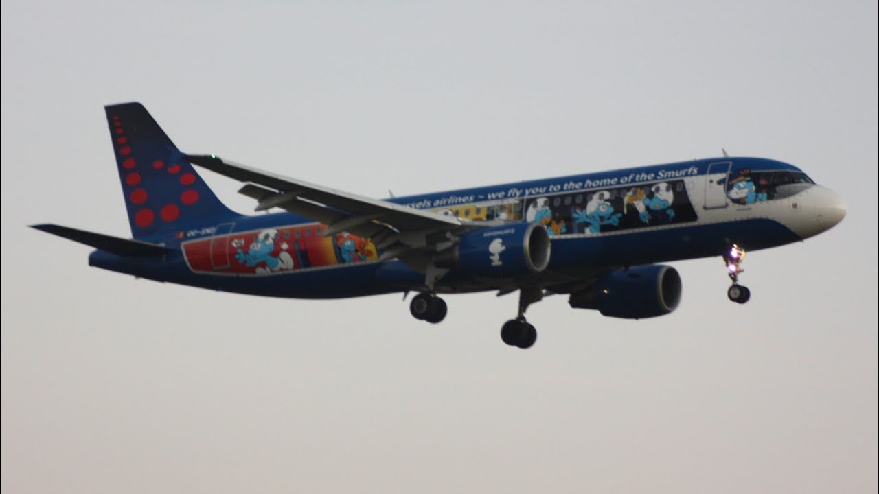 Brussels Airlines A320 'Aerosmurf' landing at Manchester Airport - YouTube