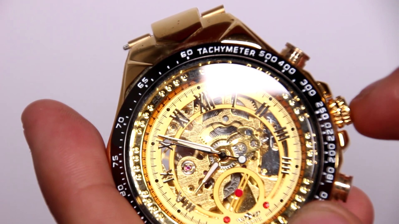 Reloj skeleton metalico dorado - YouTube
