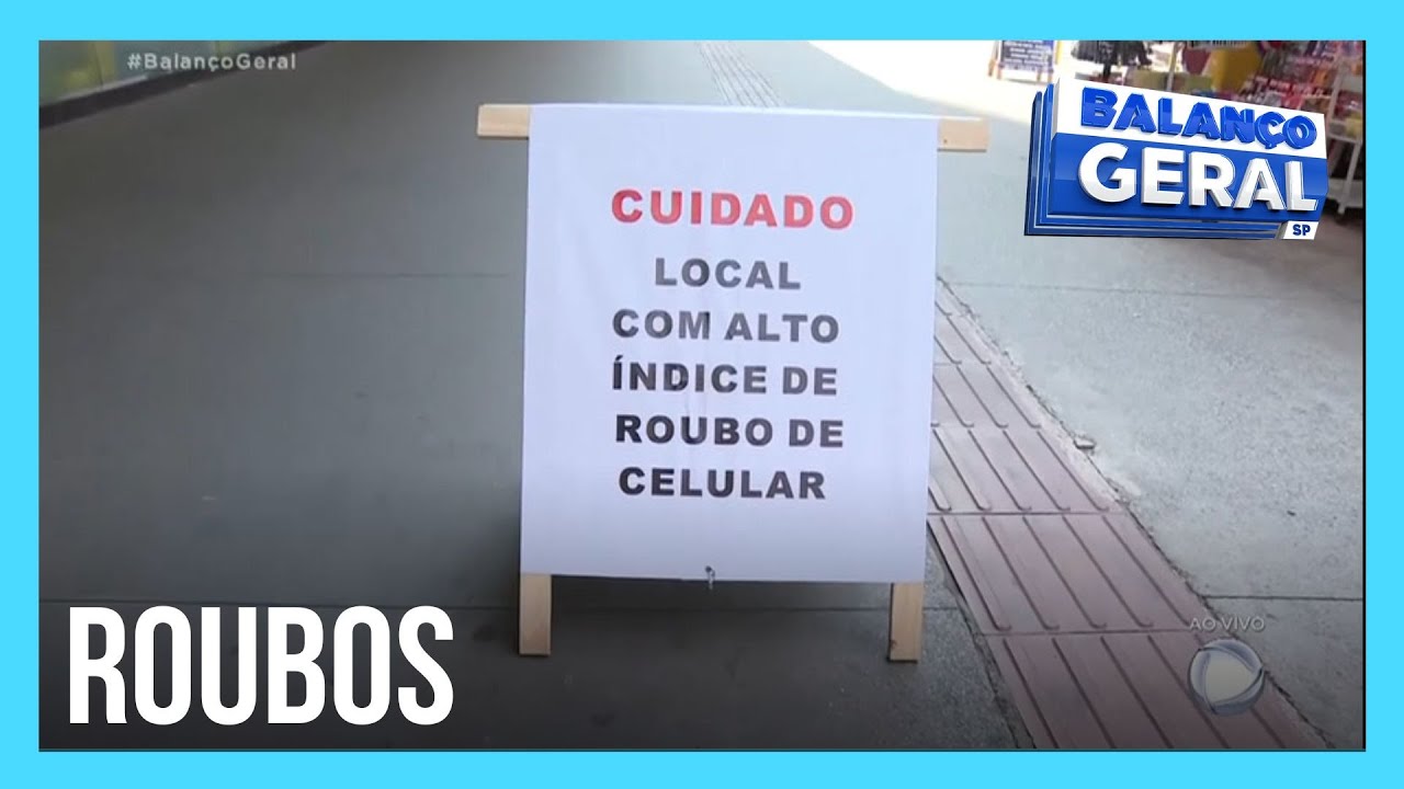 Placa com alerta de risco de roubos é colocada em avenida de São Paulo ...