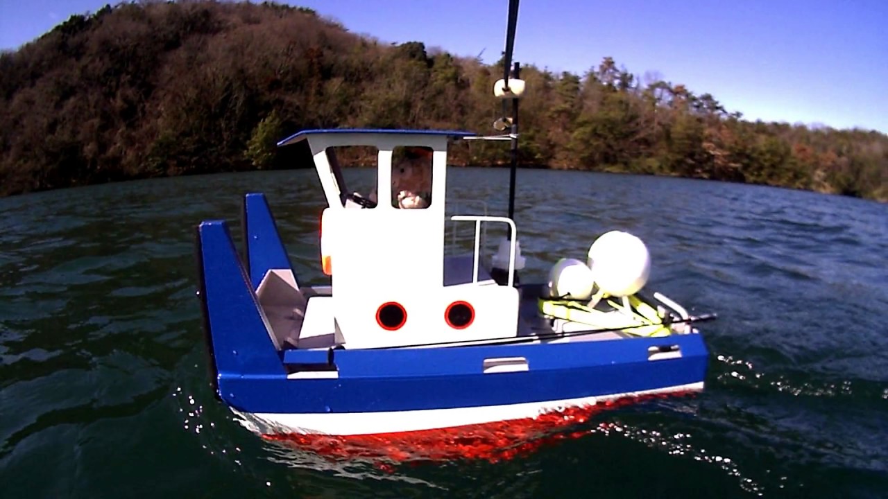Springer Tug at windy pond - YouTube
