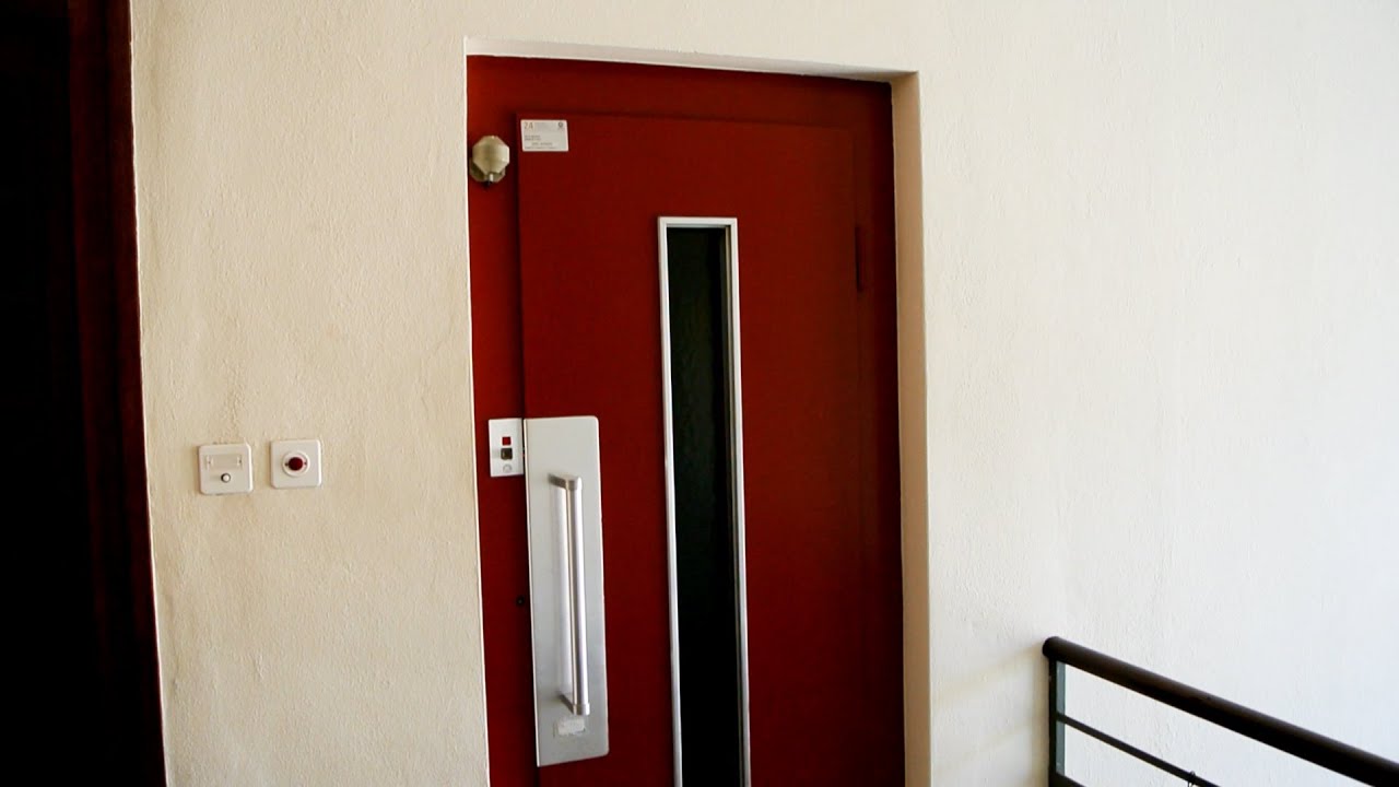 Schindler R-series traction elevator with cross-corner doors @ Via ...