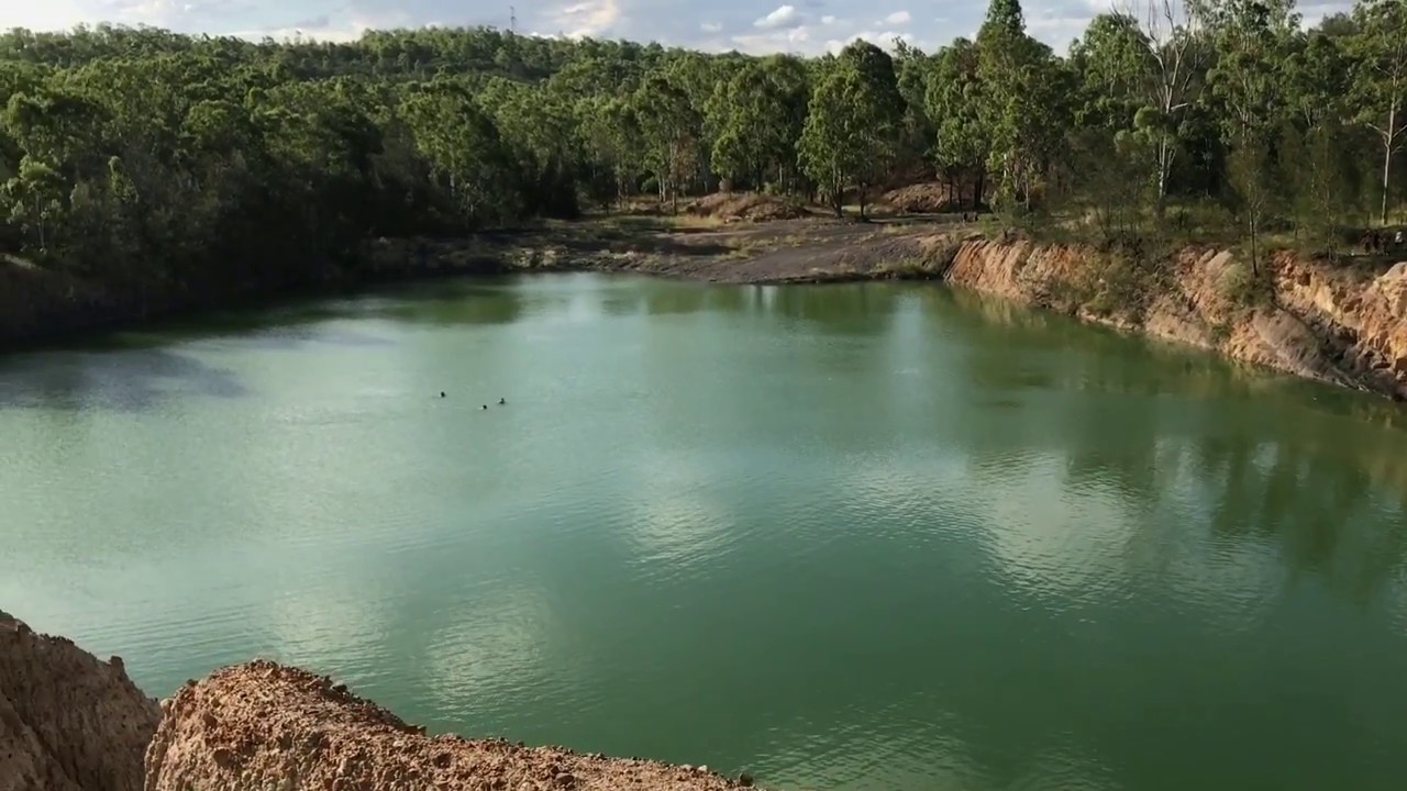 Jumping into green lakes Ipswich Queensland - YouTube