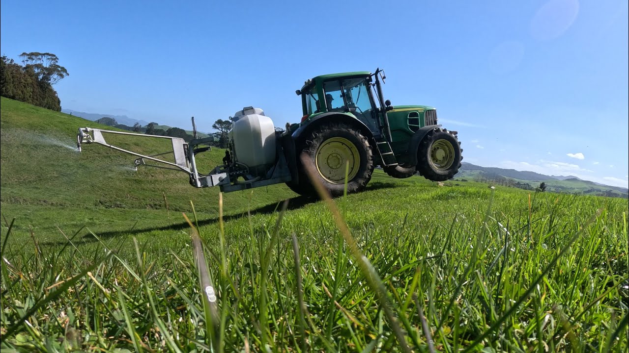 Spraying on urea to keep the grass cranking - YouTube