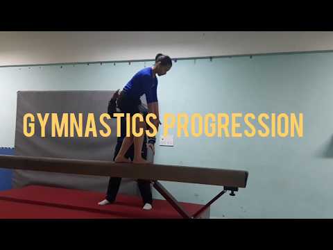 Beautiful  girl  doing gymnastics difficult skill || balancing  beam || gymnastics  progression || t