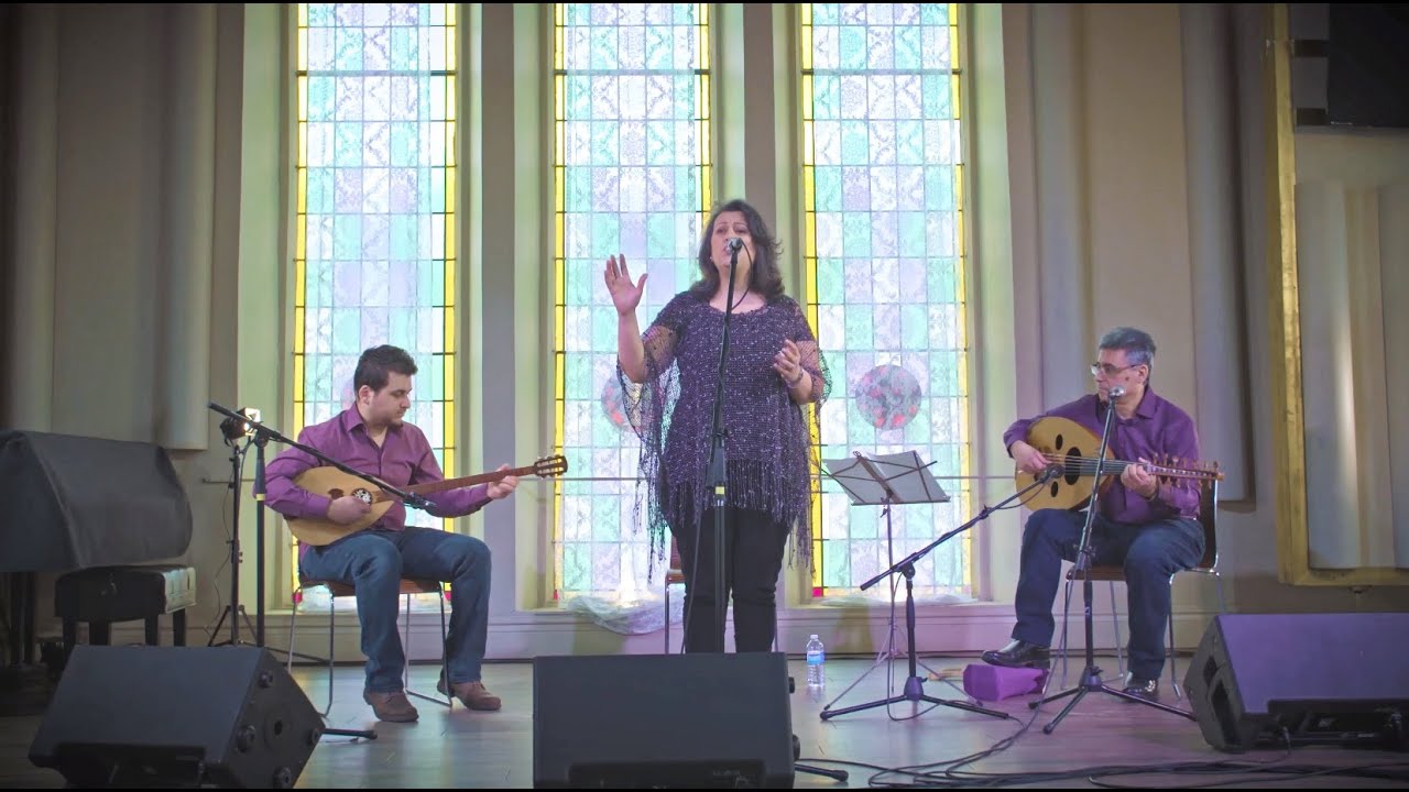 Musicians playing traditional Syrian folk songs on handcrafted ...