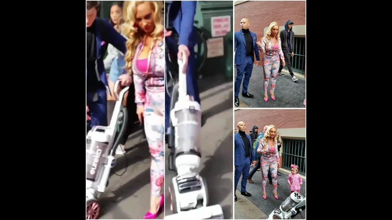 Coco Strolling Thru Soho Manhattan Has A Dude Vacuuming The Street ...