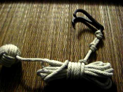Small double hook kaginawa with rope and monkey fist knot on the end ...