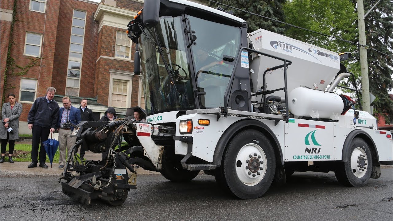 City tests new pothole repair equipment - YouTube
