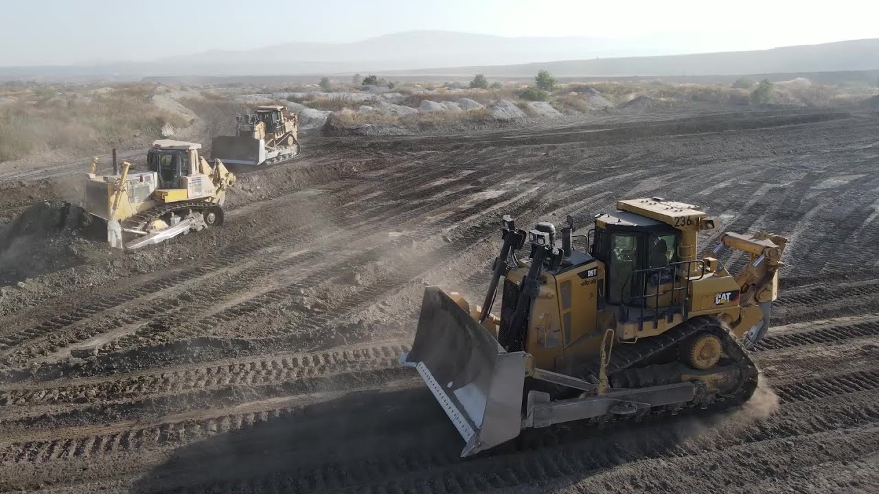 Five Caterpillar D9T And Komatsu D275 Bulldozers In Action - Aerial ...