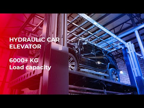 Four post hydraulic car lift with telescopic roof for heavy vehicles.  6000 kg+ load capacity