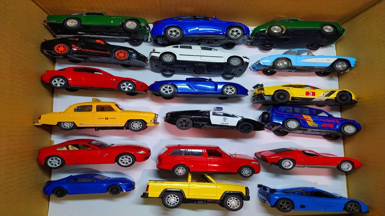Masterful Miniatures: Model Car Showcase with Jaguar, Nissan, Audi, and ...