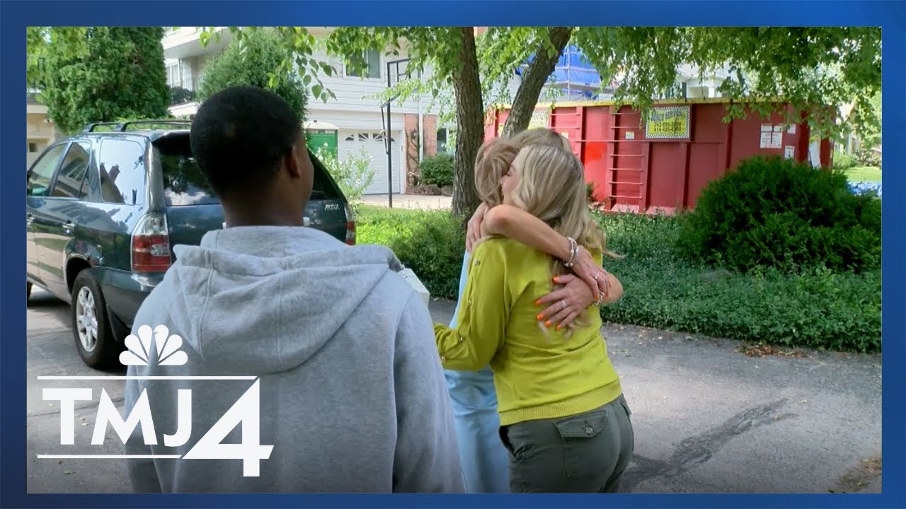 Woman stranded on car during flooding reunites with news crew who ...