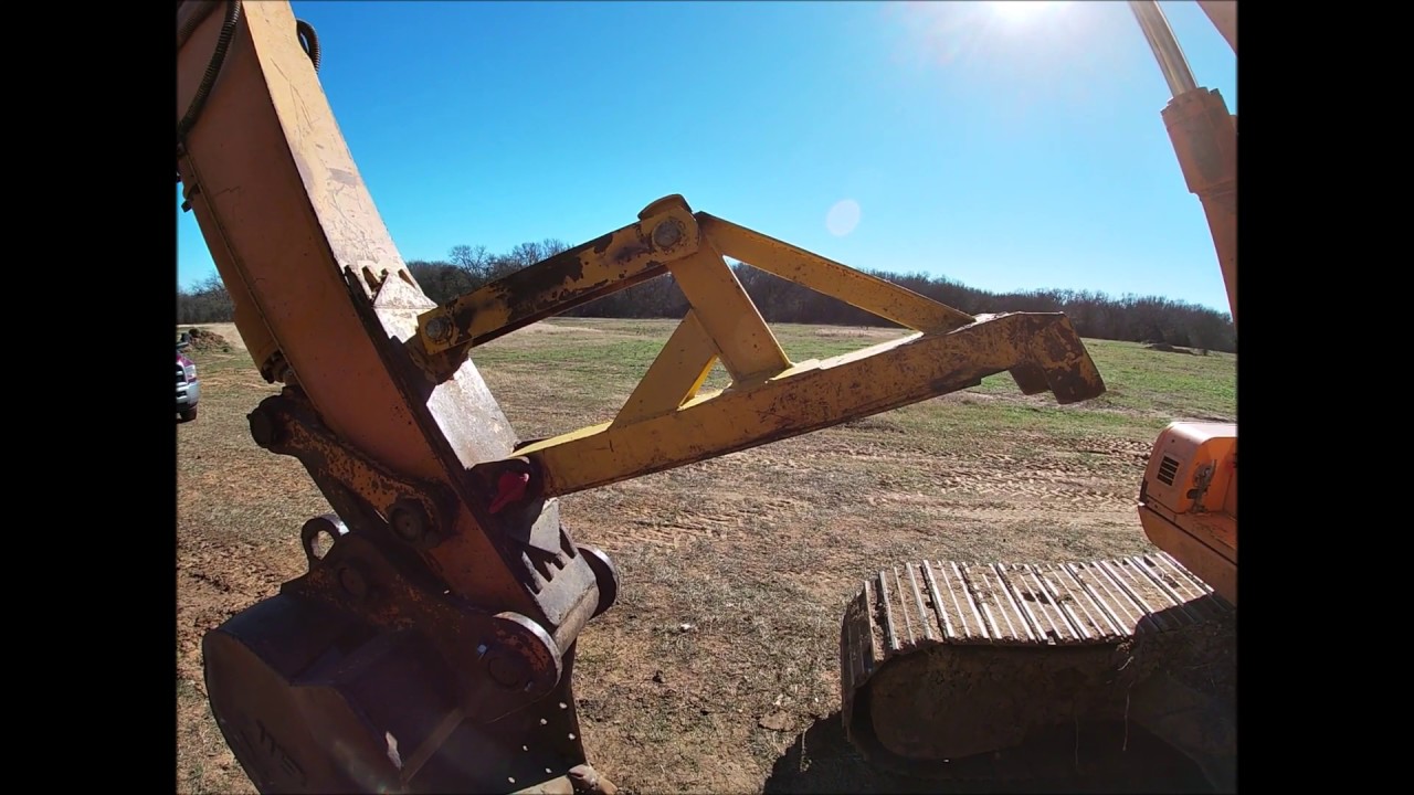 Homemade excavator thumb demo - YouTube