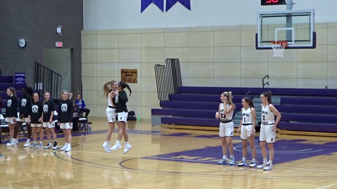 THE DOWLING CATHOLIC MAROONS BEAT THE DELASALLE ISLANDERS, 69 TO 58 ...