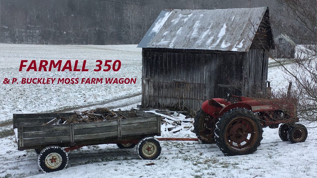 Farmall 350 and P. Buckley Moss Farm Wagon - YouTube