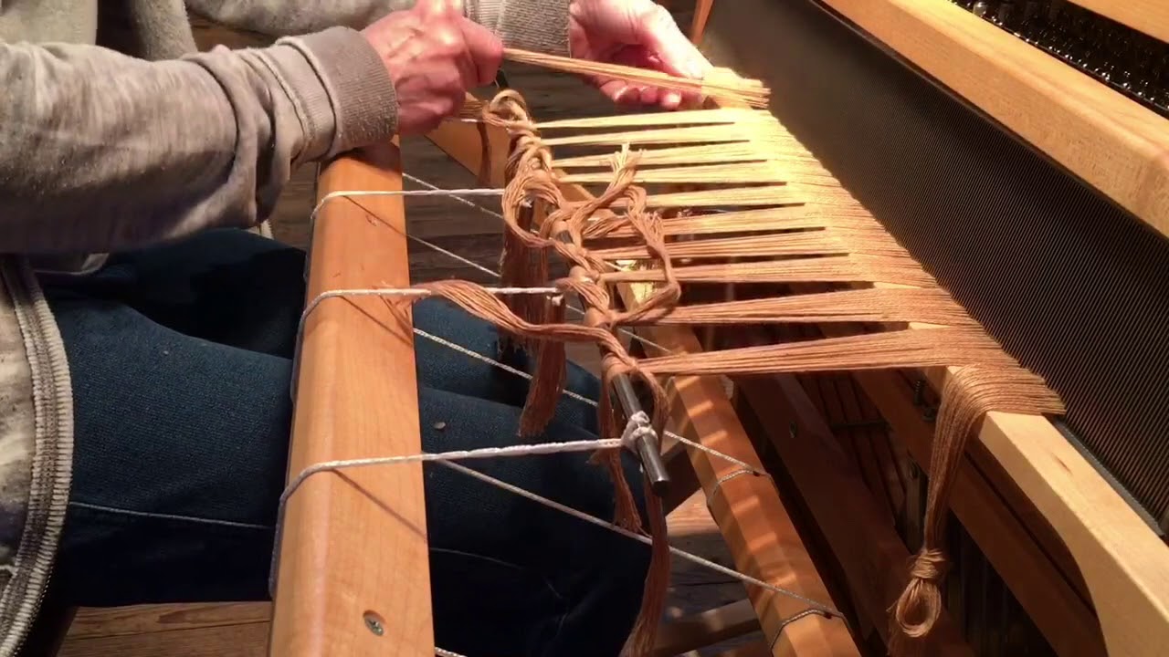 How to tie the warp onto a floor loom - YouTube