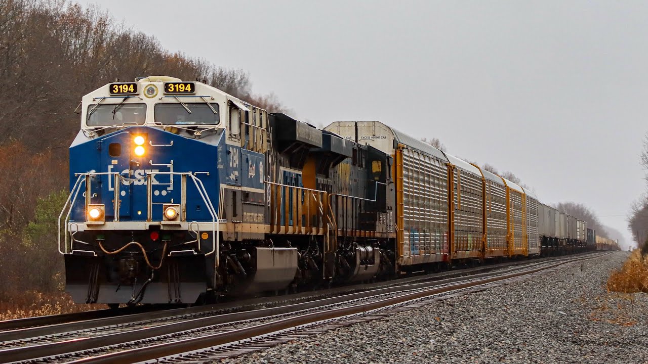 CSX 3194 "Spirit of our Law Enforcement" leads a 50 mph I018 with a ...