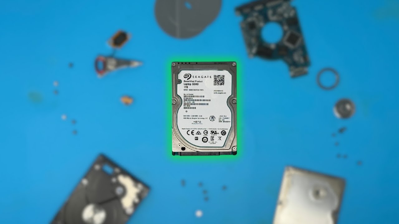 The Inside of an SSHD Hard Drive - YouTube