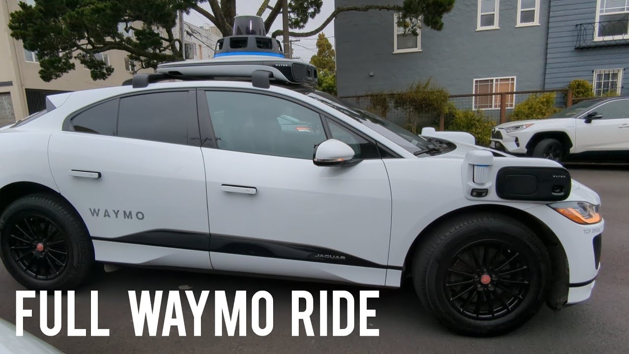 Waymo ride with pick-up and drop-off - pedestrian enters street at ...