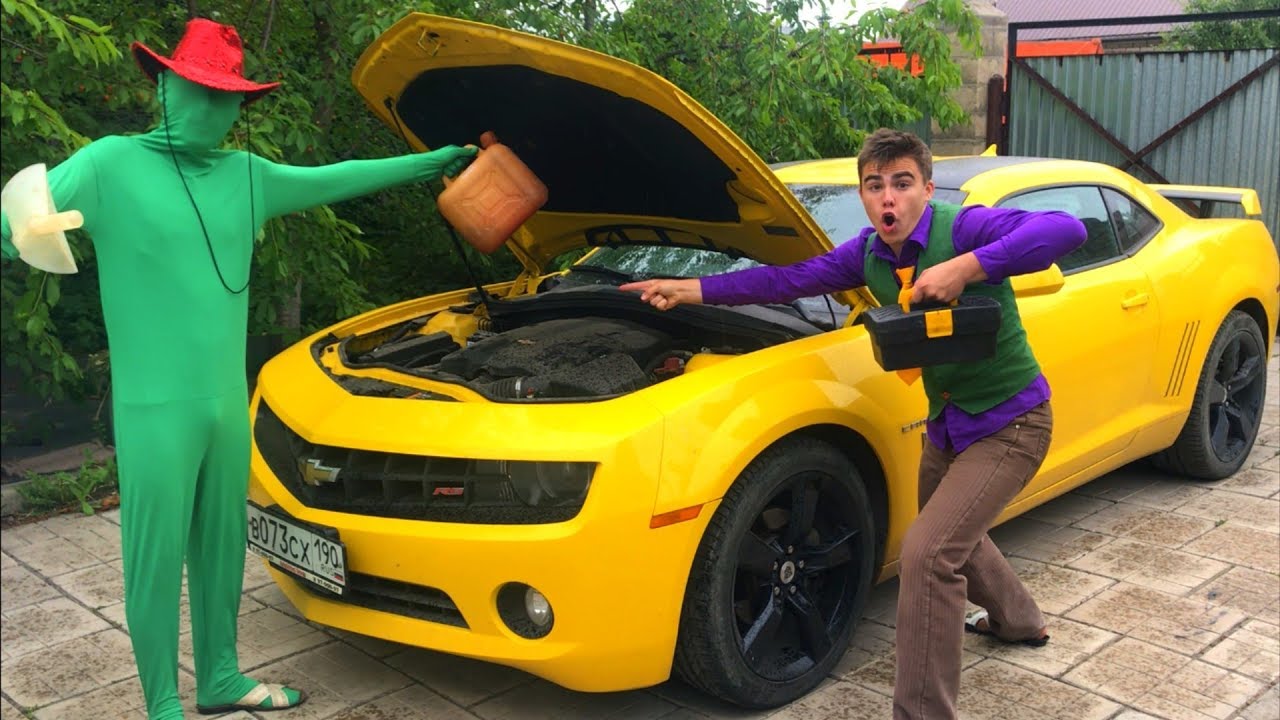 Green Man on Chevy Camaro without Petrol in Car Service of Funny Mr ...