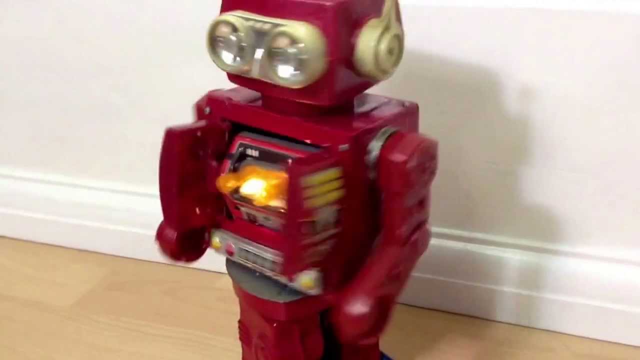 Vintage Firing Tummy Rotating Robot - YouTube