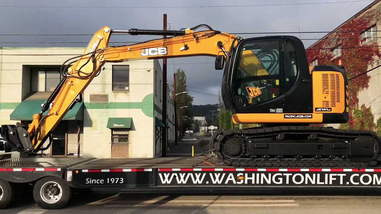 Pacific JCB delivering a new JCB JZ141 excavator - YouTube