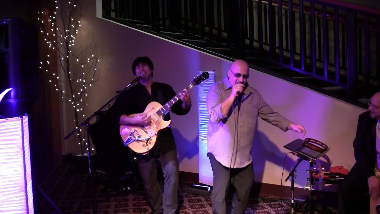 Roy Brown, Mingo Maquera, Andre Maquera and Gary Spaulding performing ...