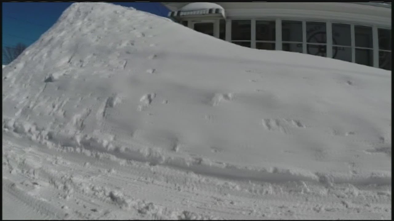 High snow banks making for dangerous driving - YouTube