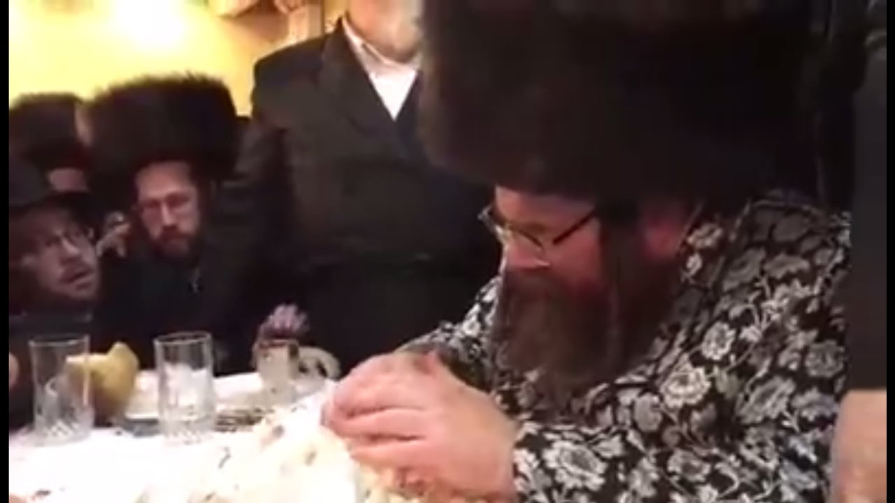 hasidic jews fighting over Rabbi's blessed holy sugar cubes - YouTube