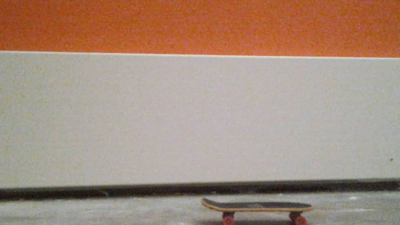 How to wall ride on fingerboard - YouTube