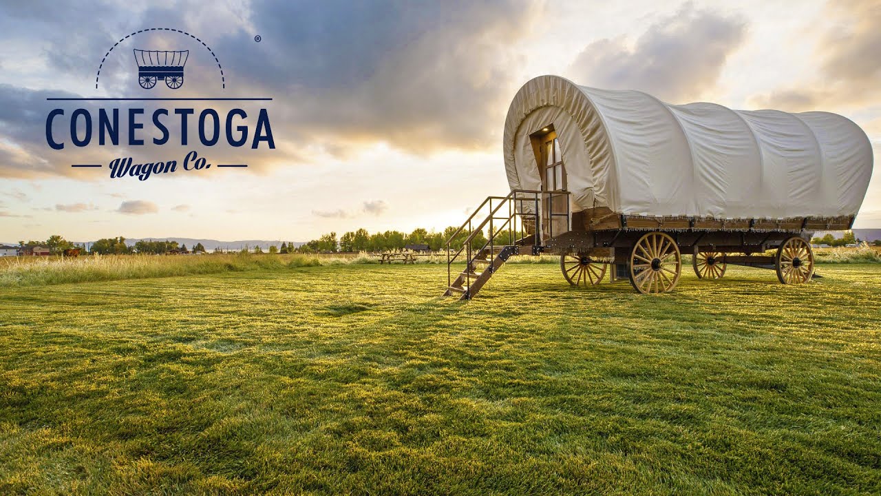 Luxury Glamping in Conestoga Covered Wagons and Shower Houses - YouTube